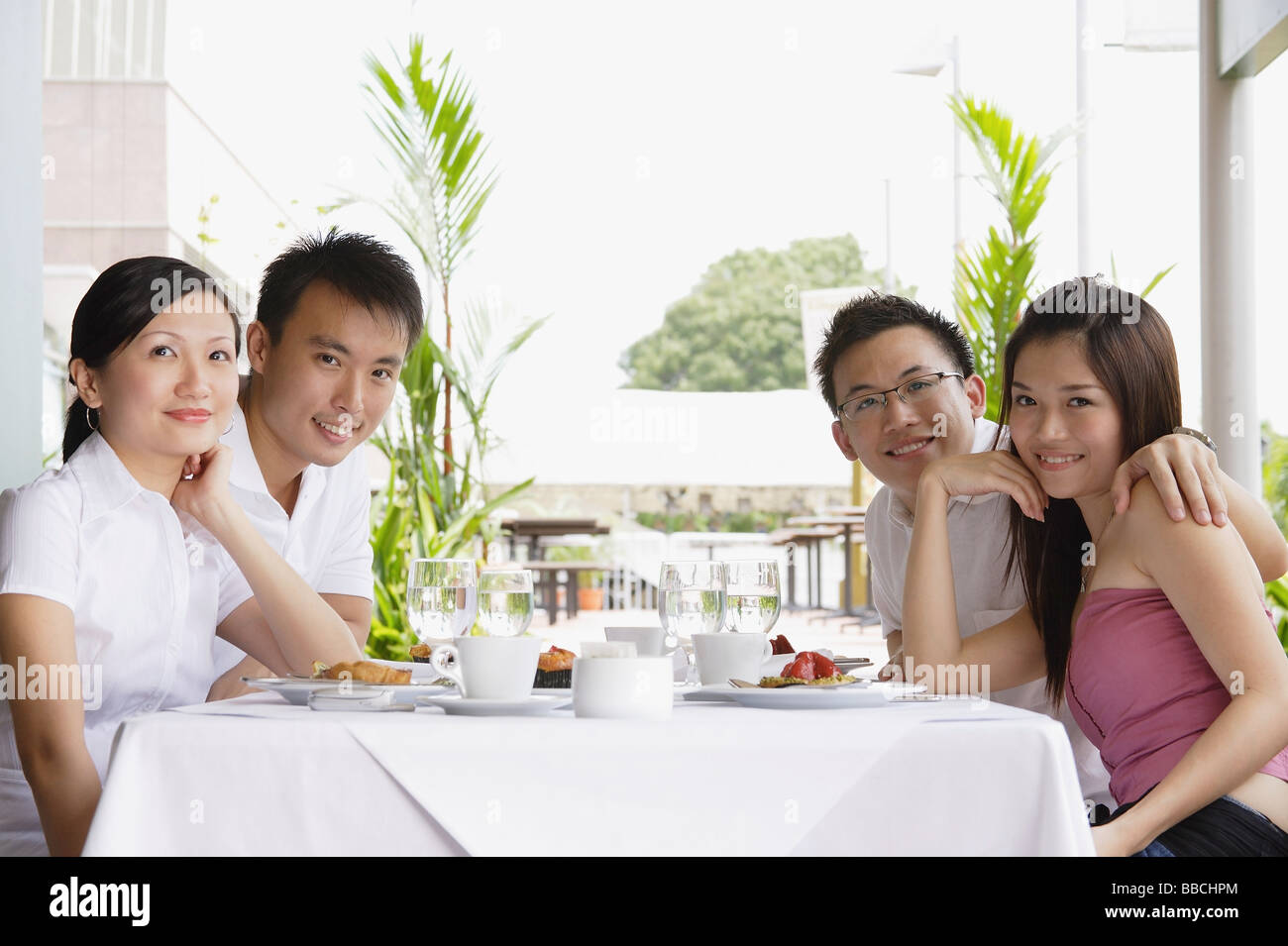 Young couples at a chinese restaurant hi-res stock photography and ...