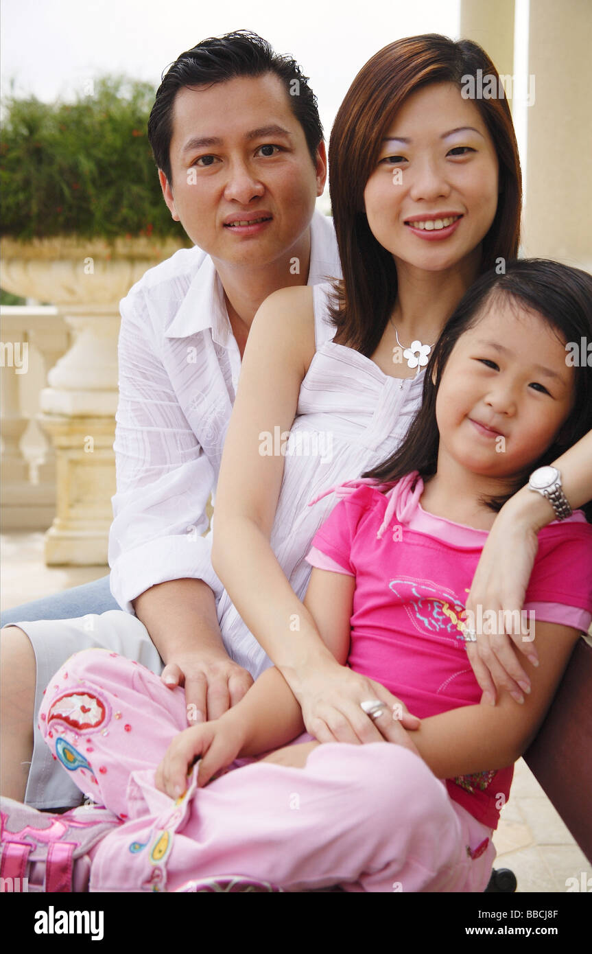 Family with one child, portrait Stock Photo - Alamy