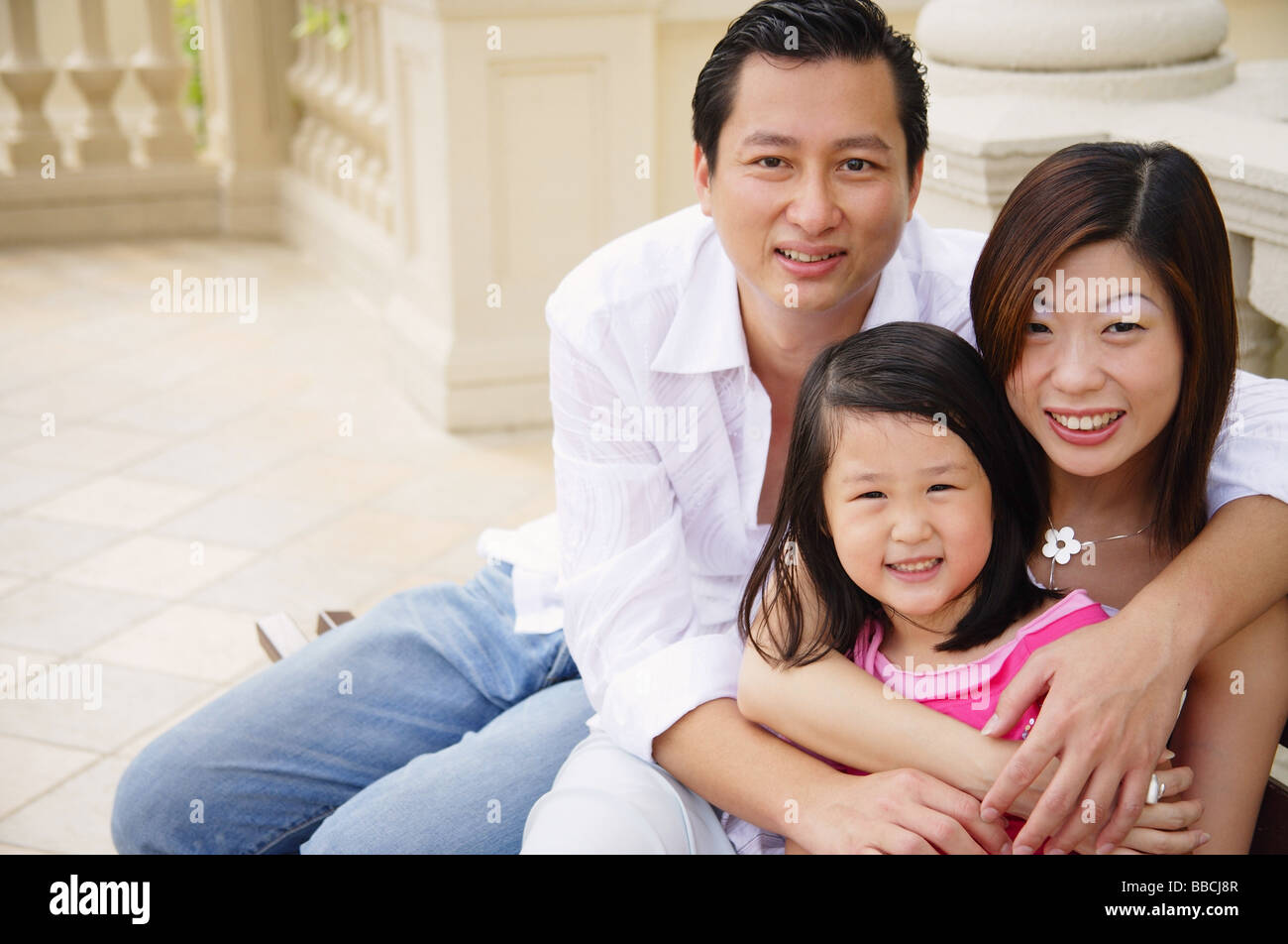 Portrait of family with one child Stock Photo - Alamy