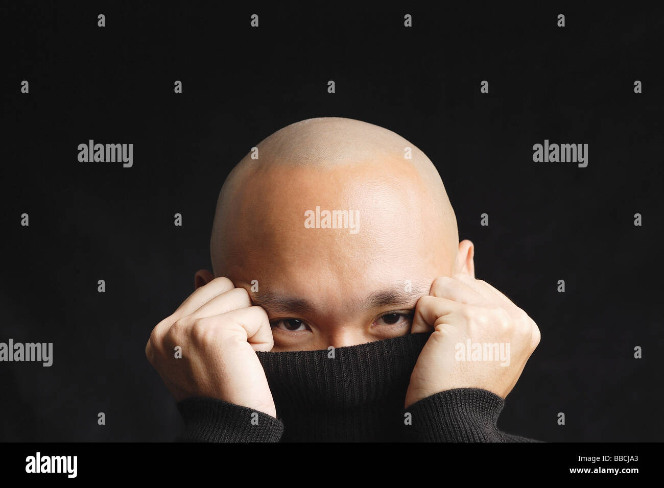 Man hiding horizontal hi-res stock photography and images - Alamy