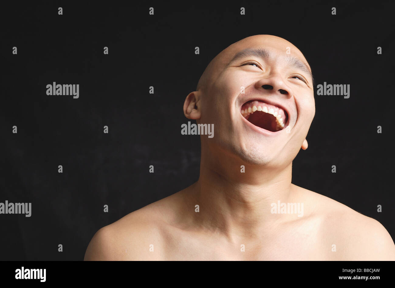 Bald man, laughing, mouth open Stock Photo - Alamy
