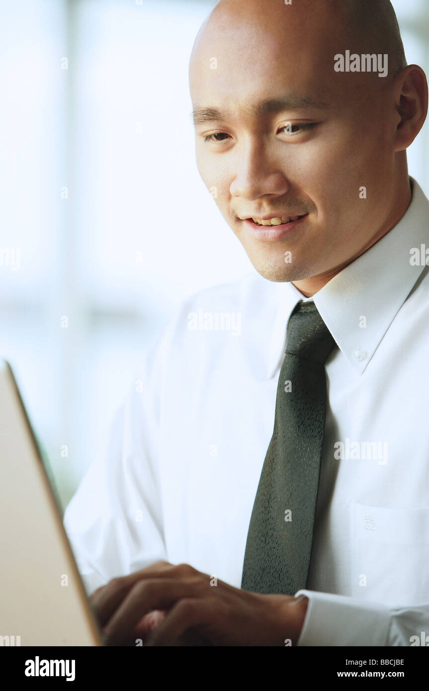 Man using computer Stock Photo - Alamy