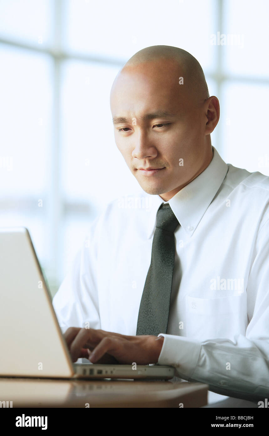 Man using computer, portrait Stock Photo - Alamy