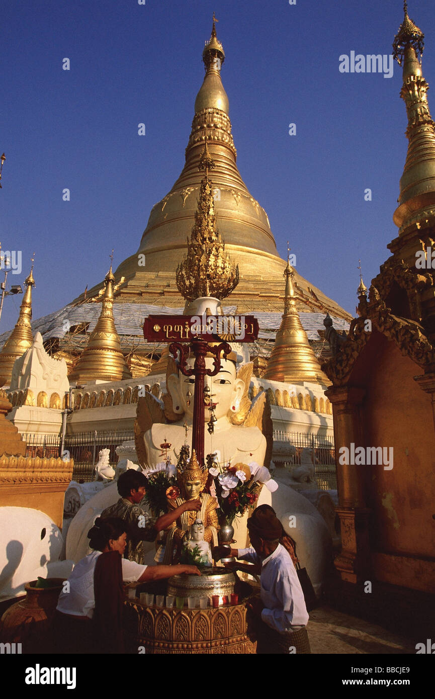 Myanmar (Burma), Yangon, Shwedagon Paya, Worshippers at Washing Buddha ...