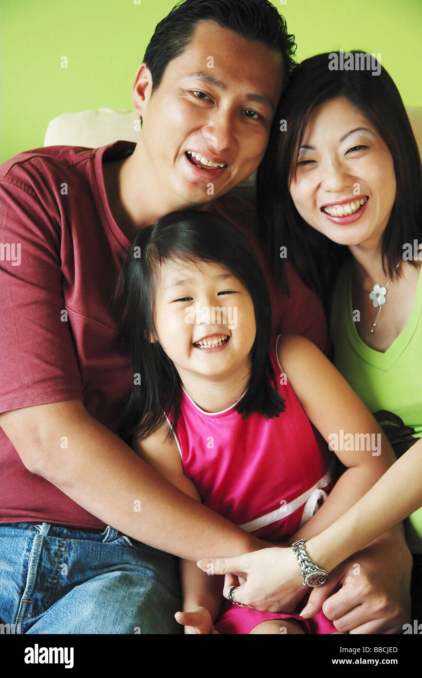 Family with one child, portrait Stock Photo - Alamy