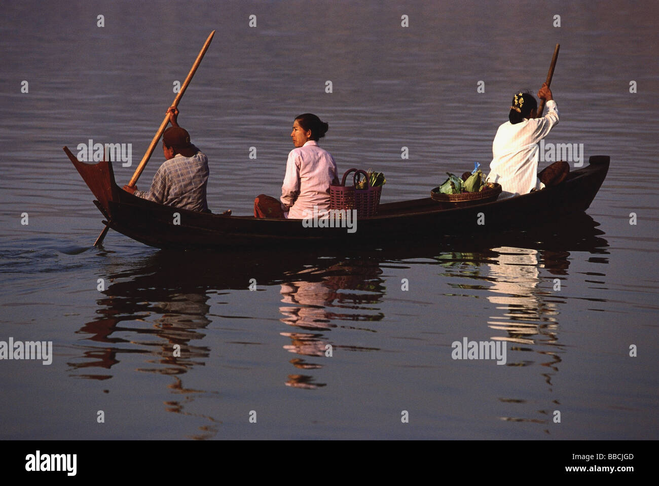 Myanmar (Burma), Pyay, Women crossing Irrawaddy river in a canoe Stock ...