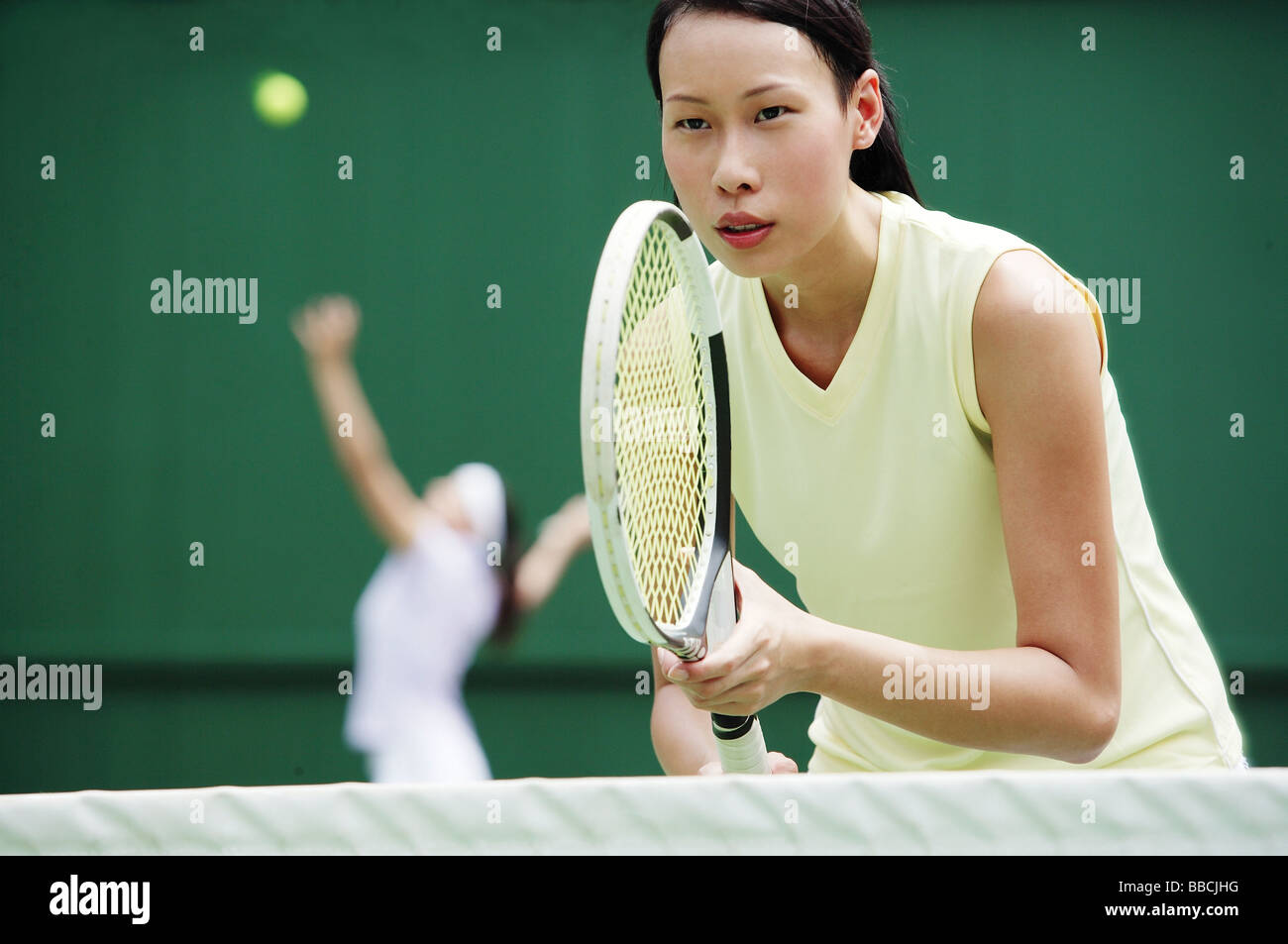 Women playing tennis Stock Photo - Alamy