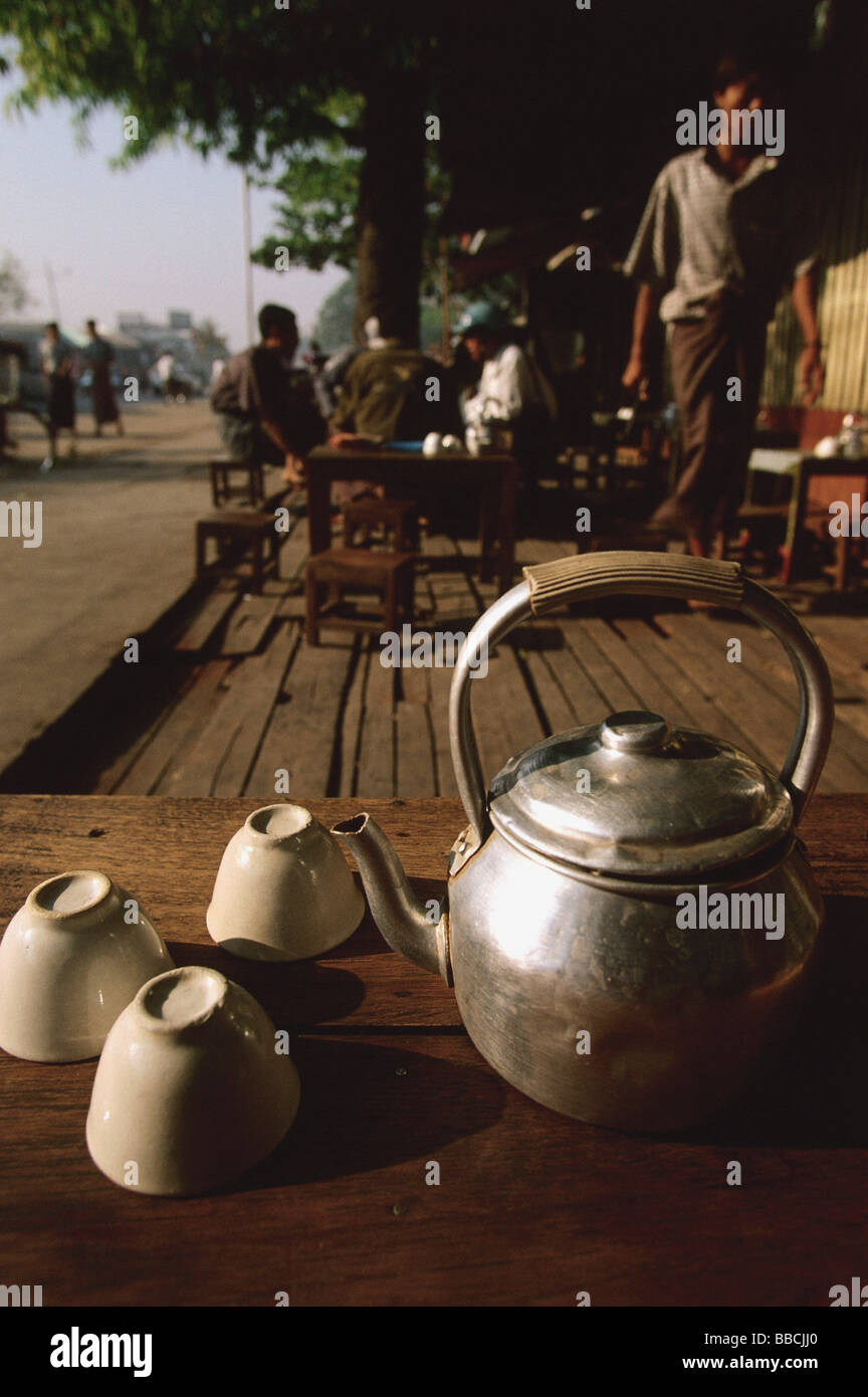 Myanmar (Burma), Pyay, Teapot and upturned cups at roadside teashop ...