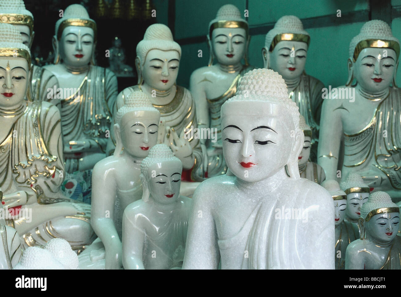 Myanmar (Burma), Mandalay, Marble Buddha statuettes on display in ...