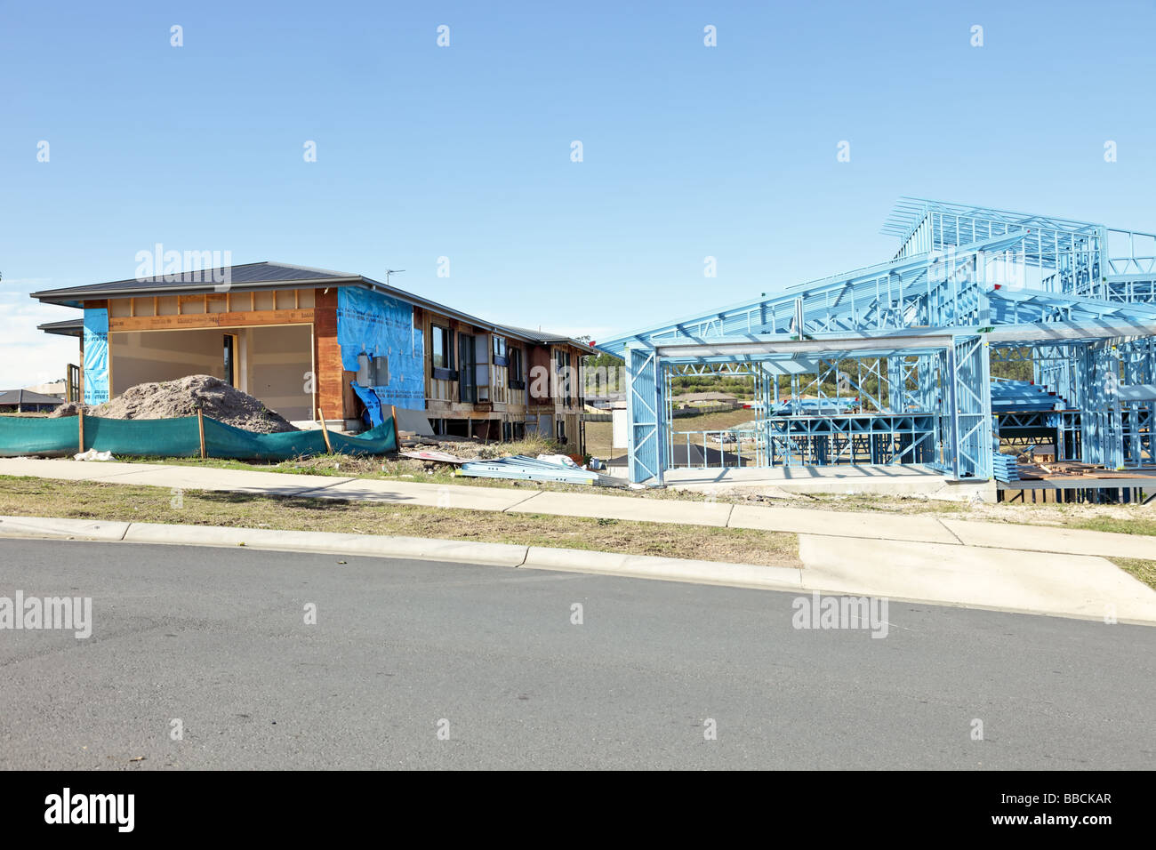 Residential housing under construction on new estate using steel frame ...