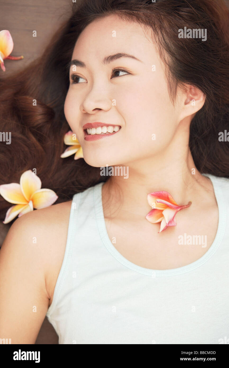 Women flowers in hair hi-res stock photography and images - Alamy