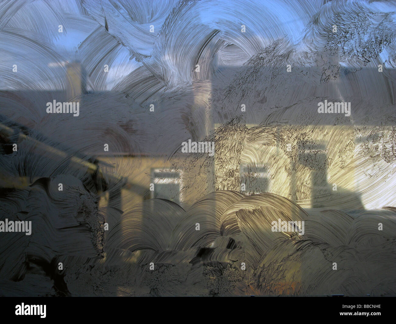 property window with white wash pattern and houses Stock Photo - Alamy