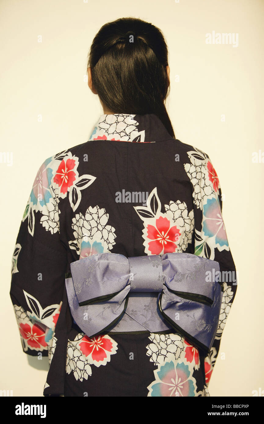 Young woman in kimono, rear view Stock Photo - Alamy