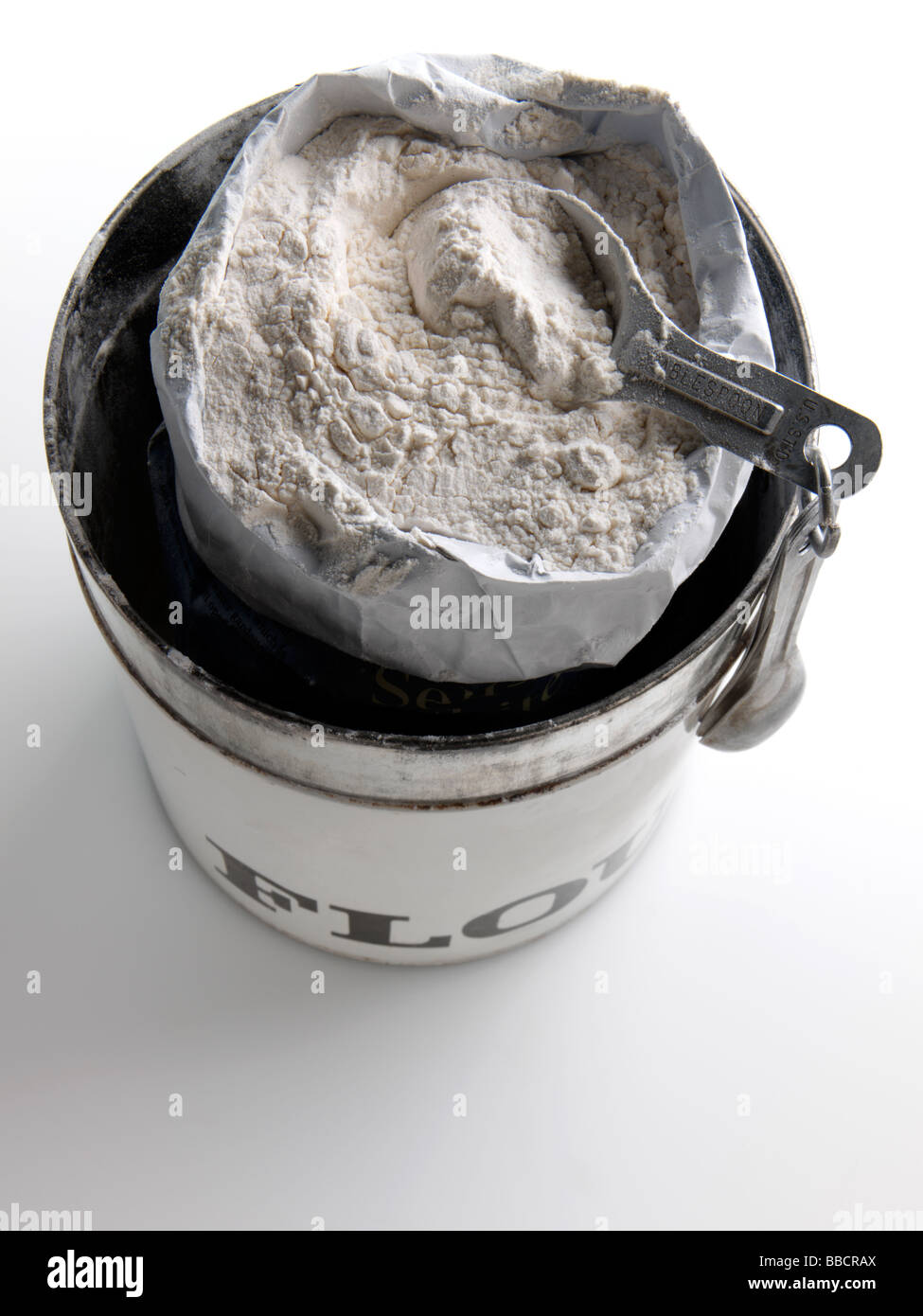 Flour in a packet inside a tin Stock Photo - Alamy