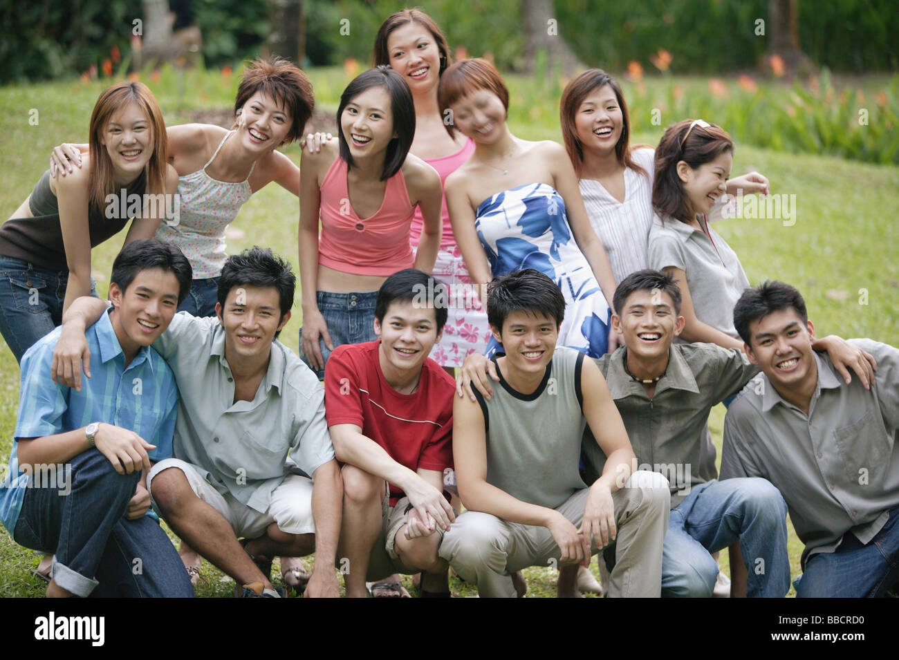 Group of young people posing for camera Stock Photo - Alamy