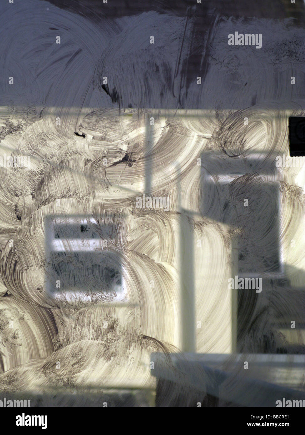 property window with white wash pattern and houses Stock Photo - Alamy