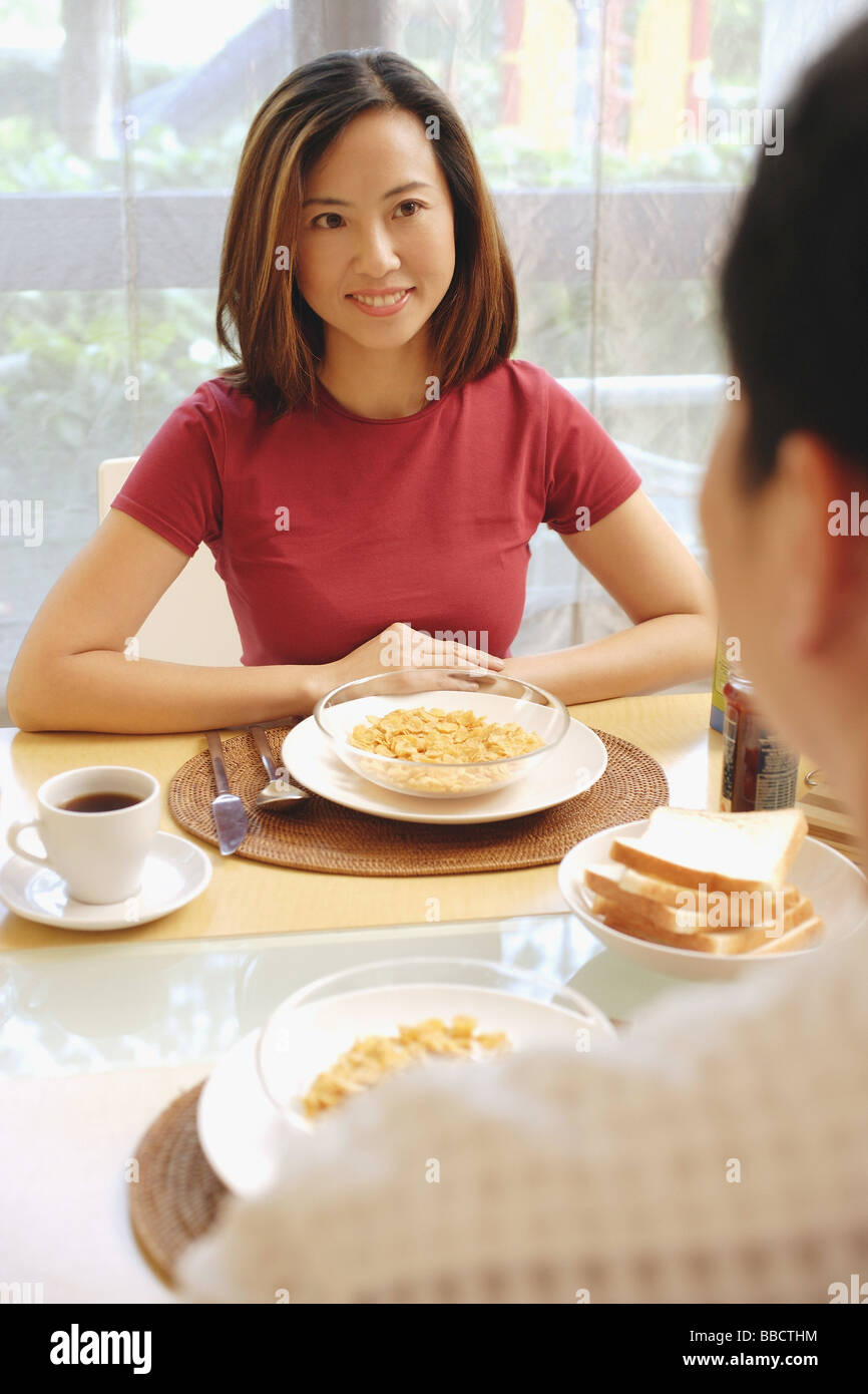 Couple sitting across from each other hi-res stock photography and ...