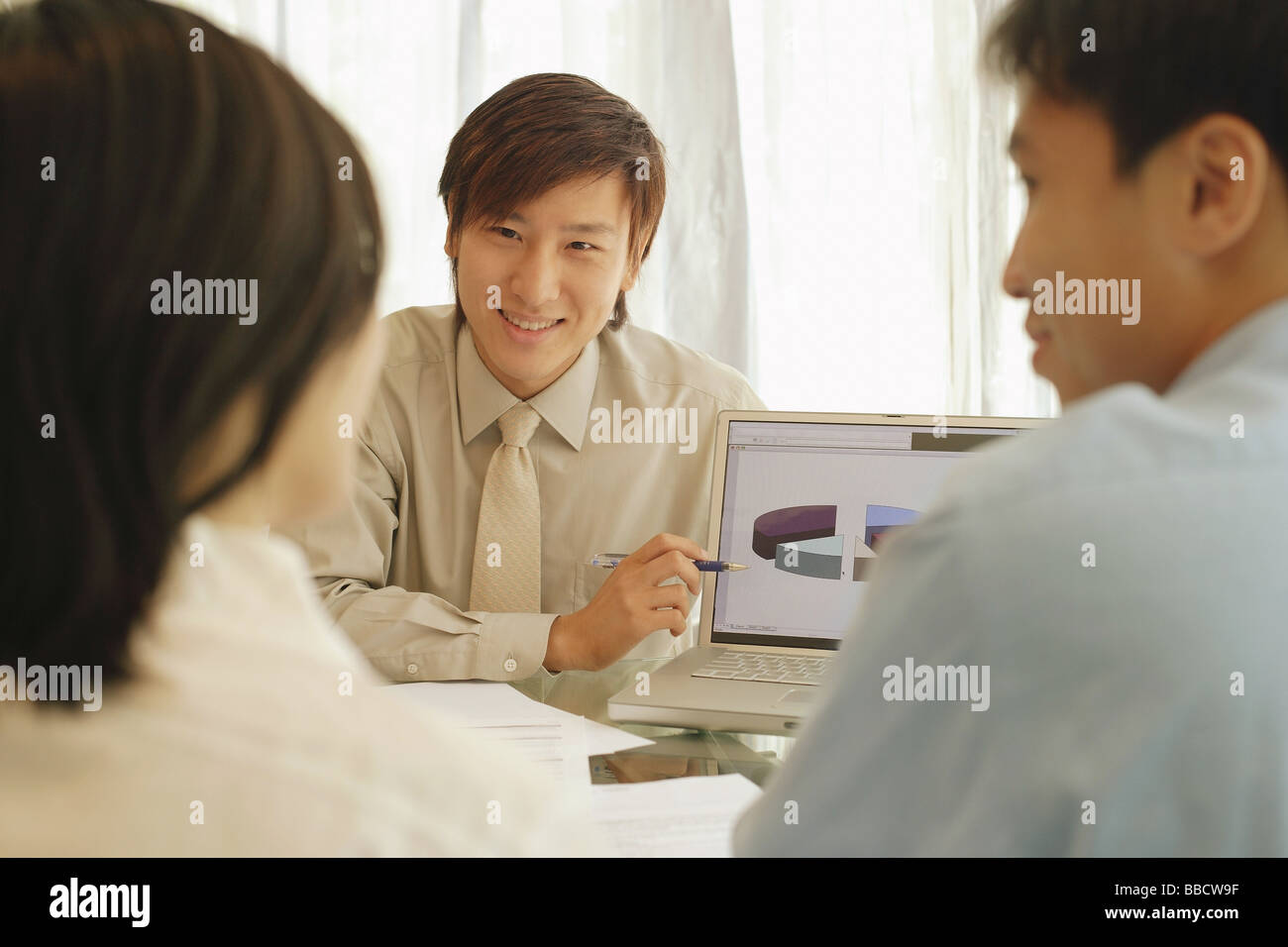 Front view asian insurance agent hi-res stock photography and images ...