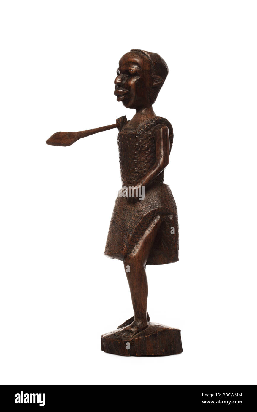 African wooden figure isolated on white Stock Photo - Alamy