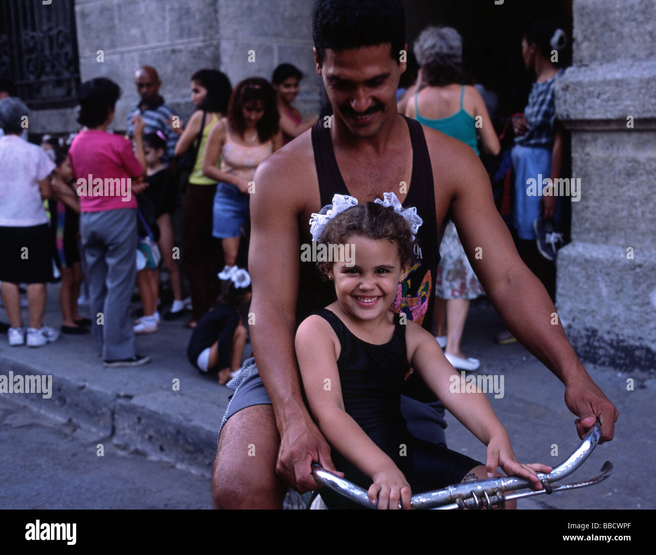 A father collects his daughter from school on Old Havana Cuba Stock ...