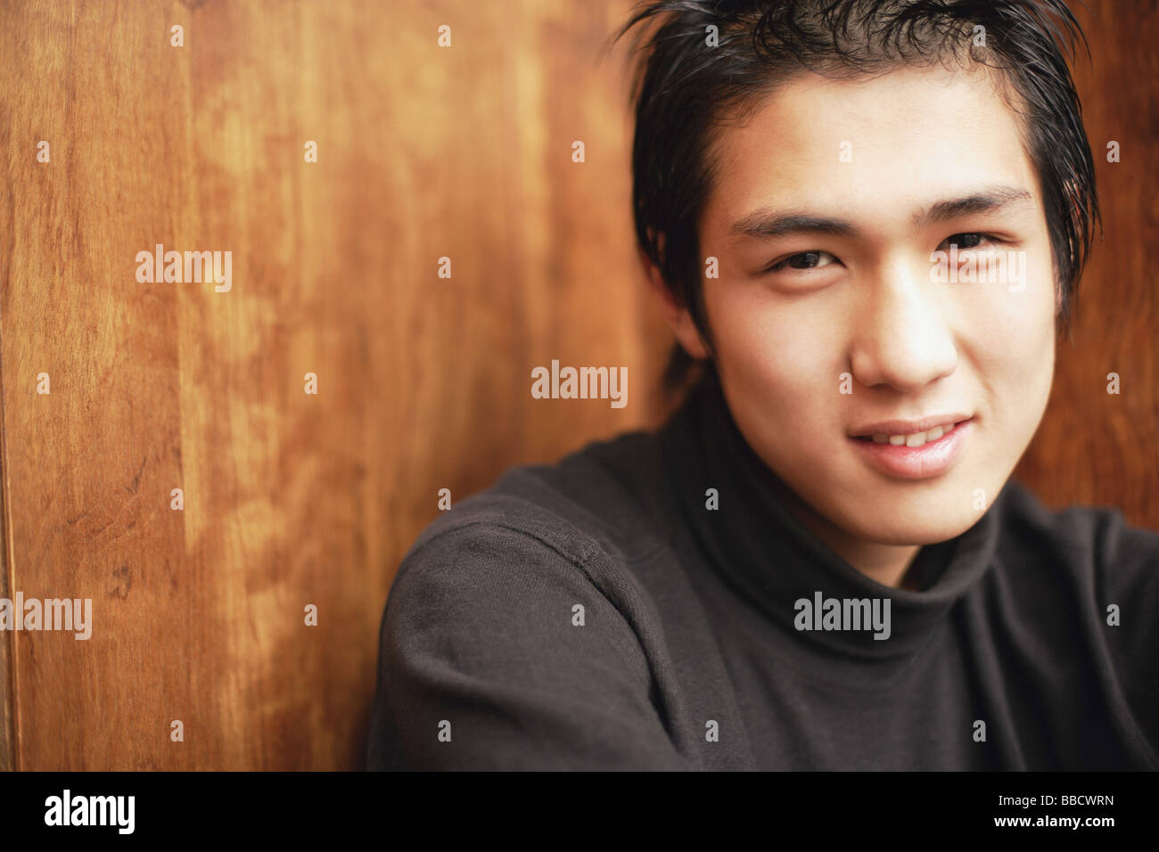 Young man looking at camera, portrait Stock Photo - Alamy