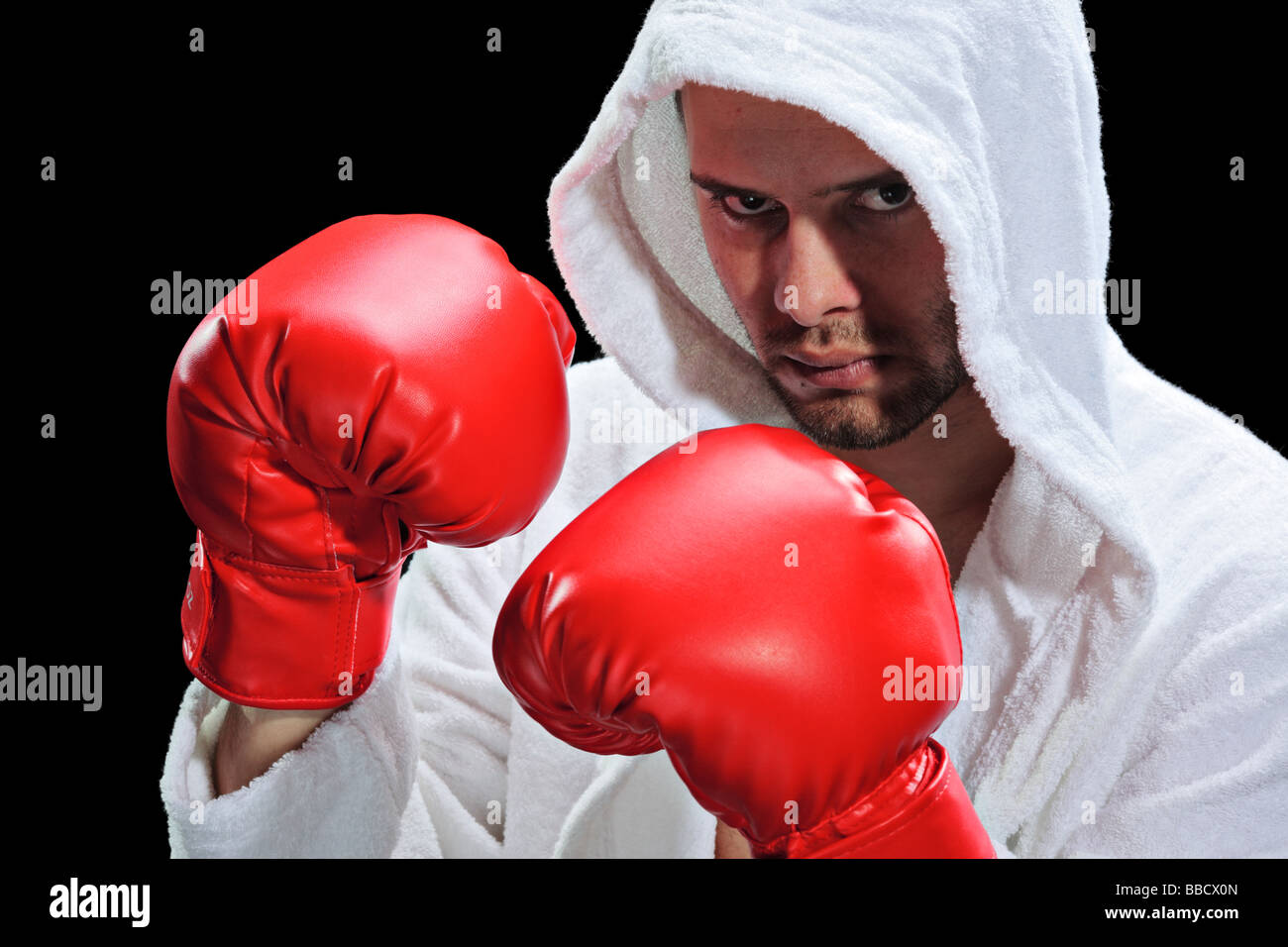 Get ready for a fight Boxer against blackbackground Stock Photo - Alamy