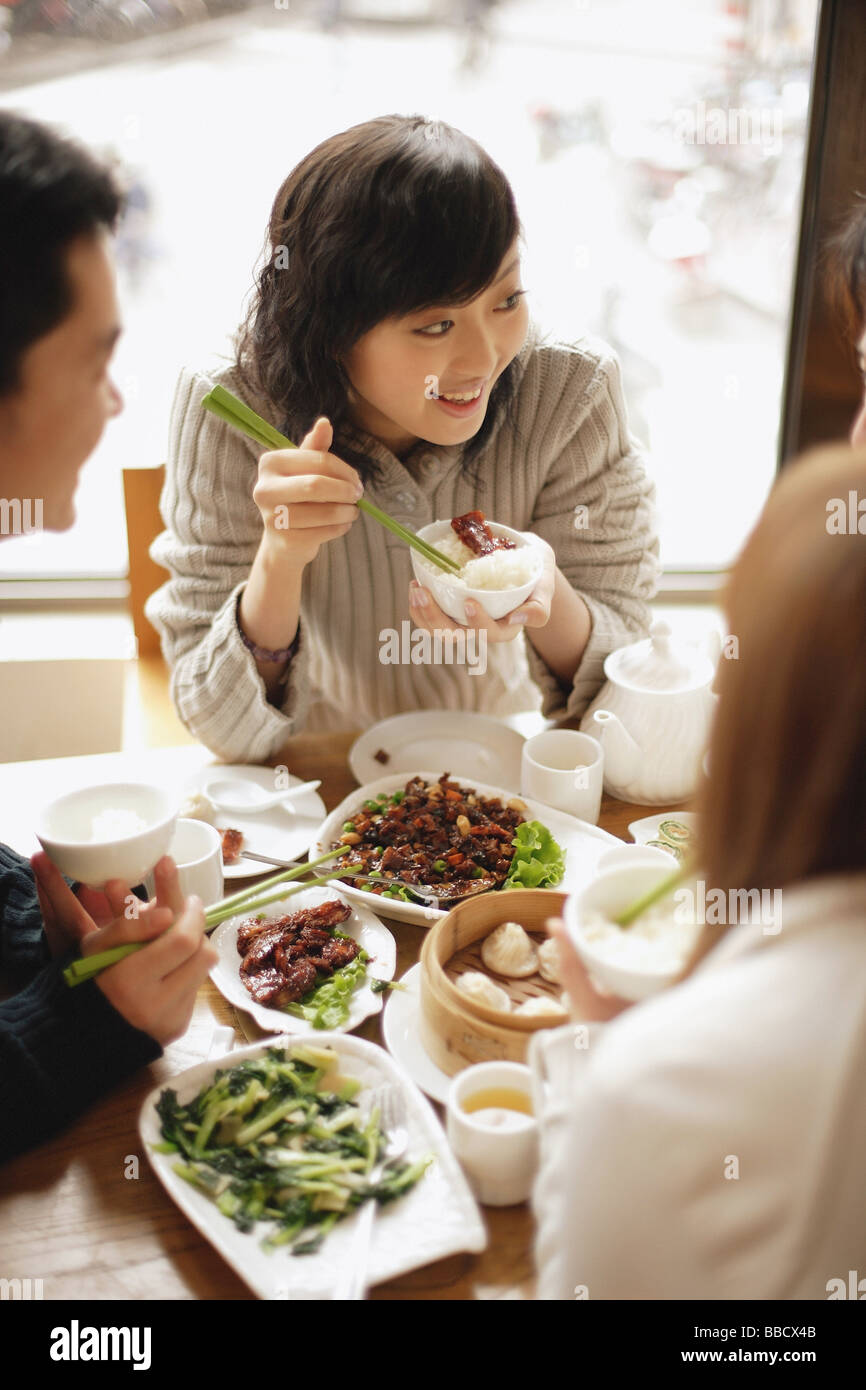 Couples eating at a Chinese restaurant Stock Photo - Alamy