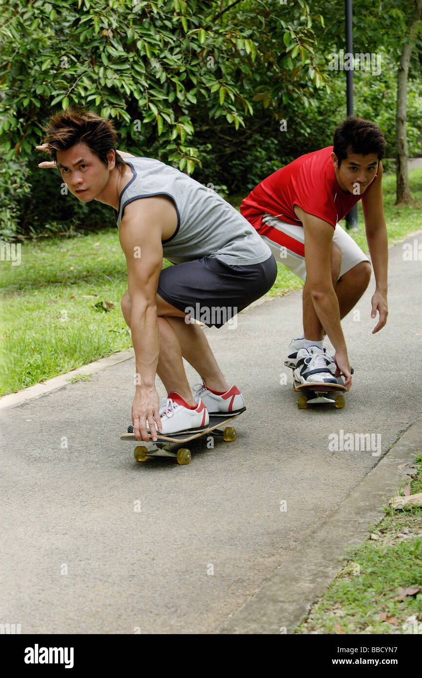 Two guys on skateboards Stock Photo - Alamy