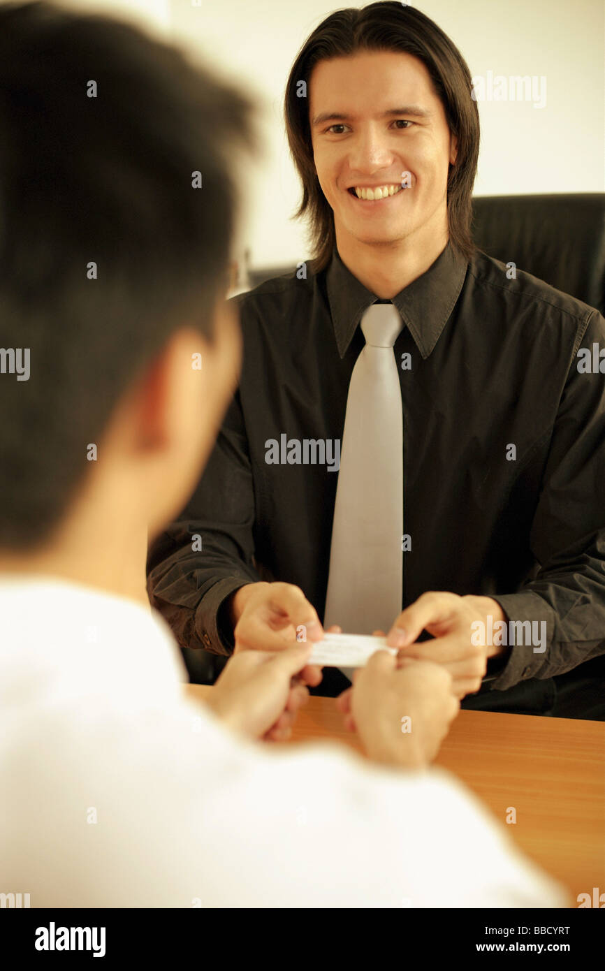 Two executives sitting across desk hi-res stock photography and images ...