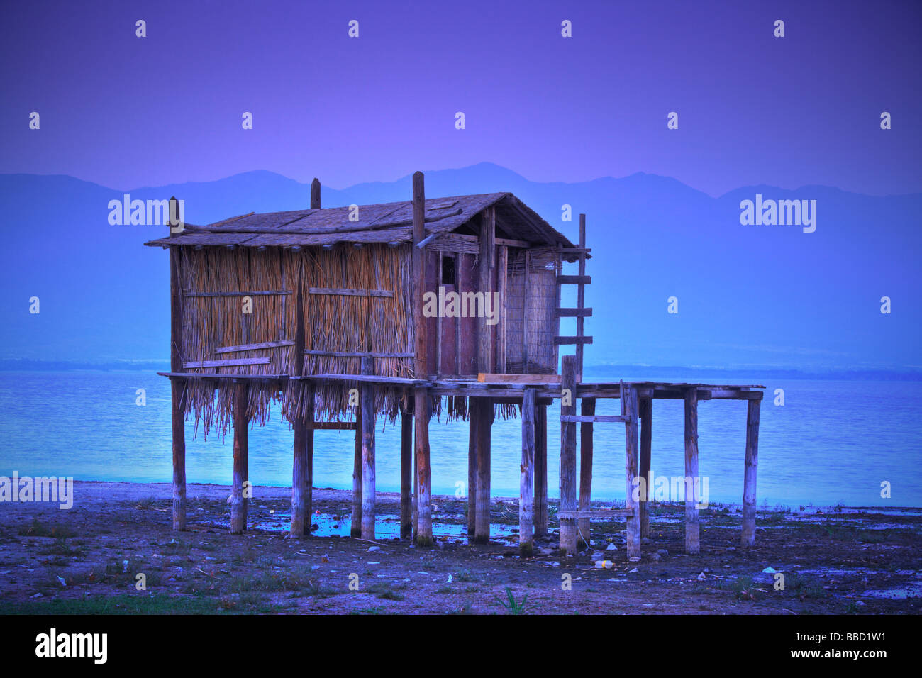 Traditional fishing hut at Dojran lake, at dawn Stock Photo - Alamy