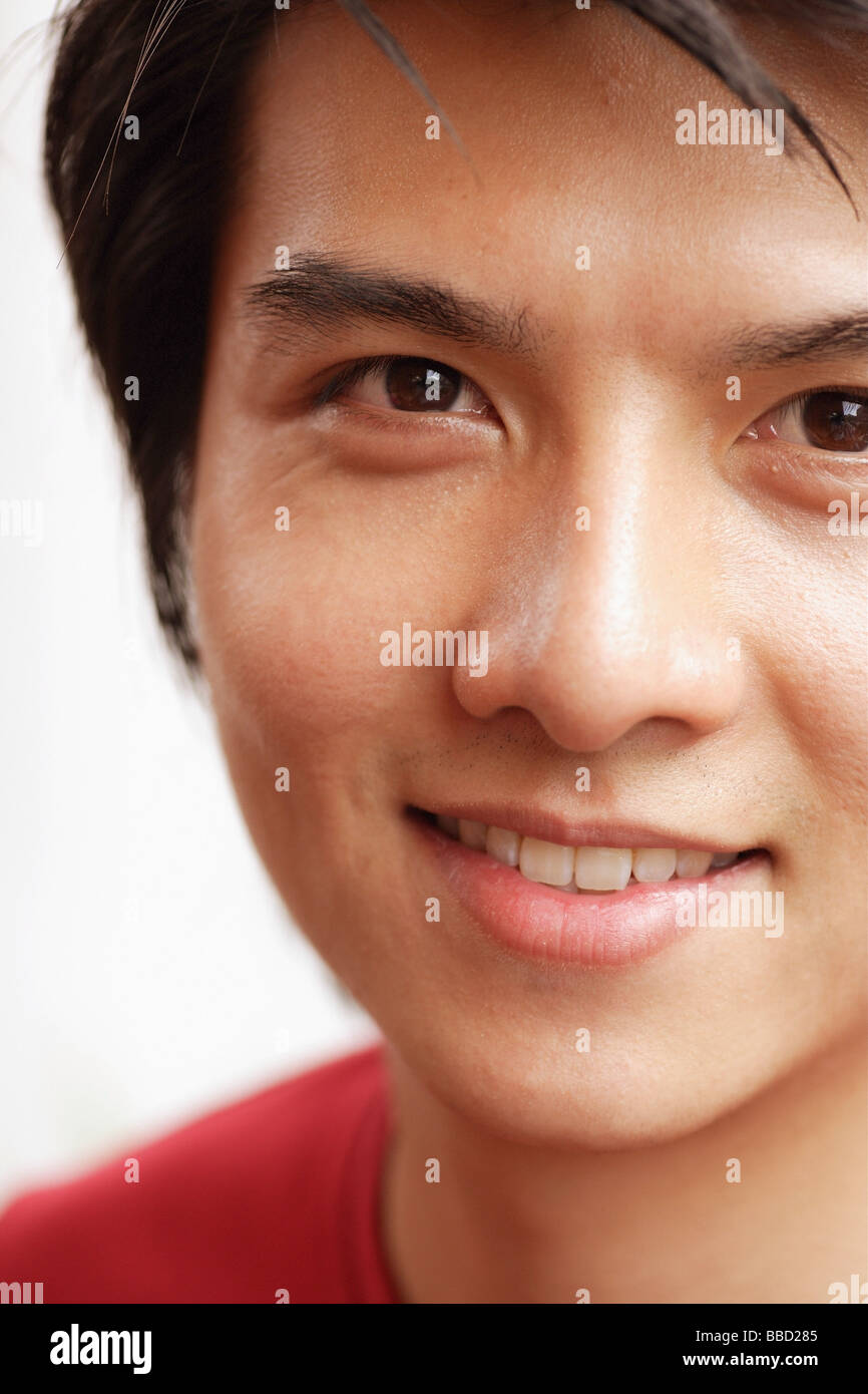 Young asian man close hi-res stock photography and images - Alamy