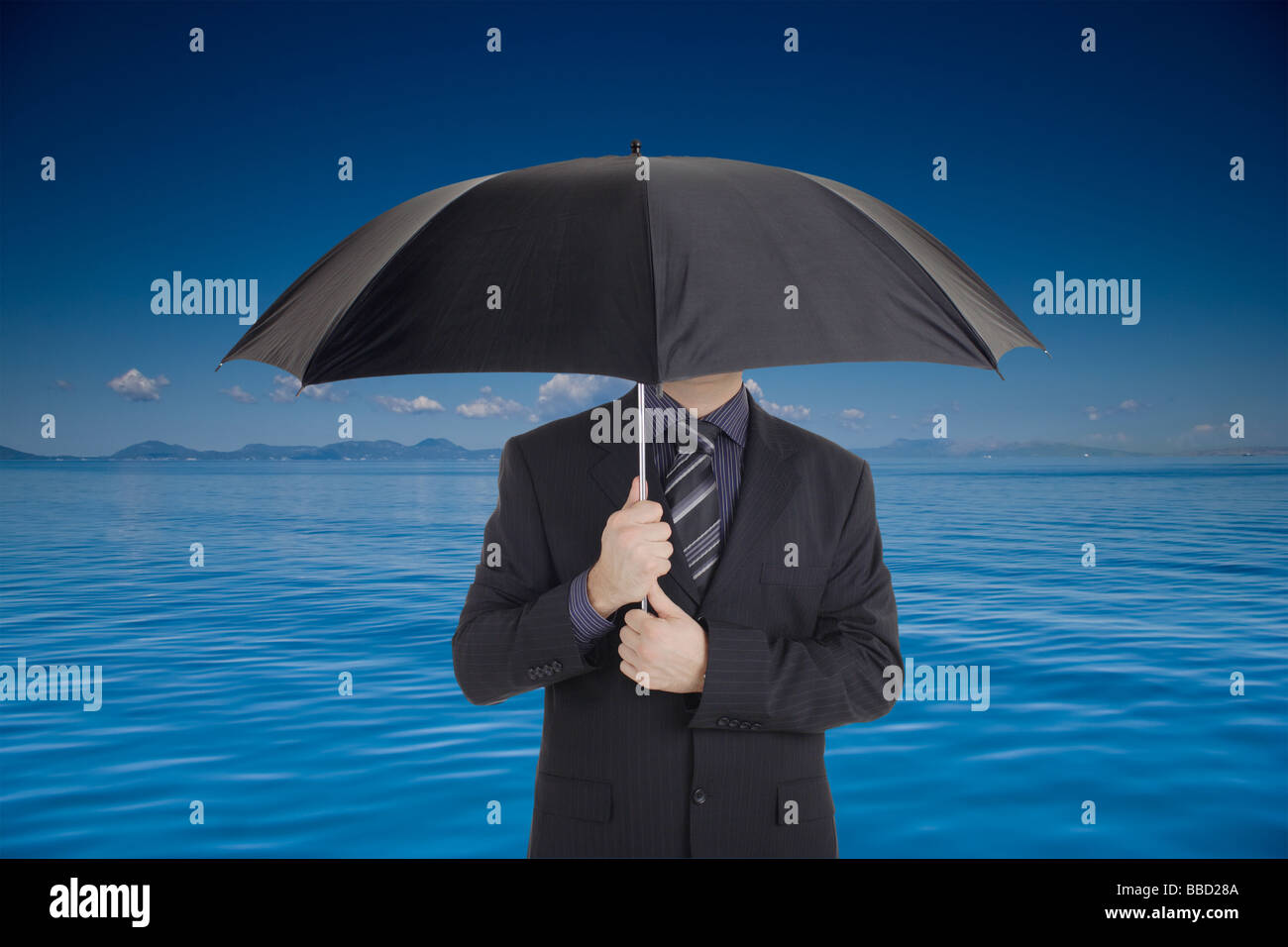 Young businessman holding shield hi-res stock photography and images ...