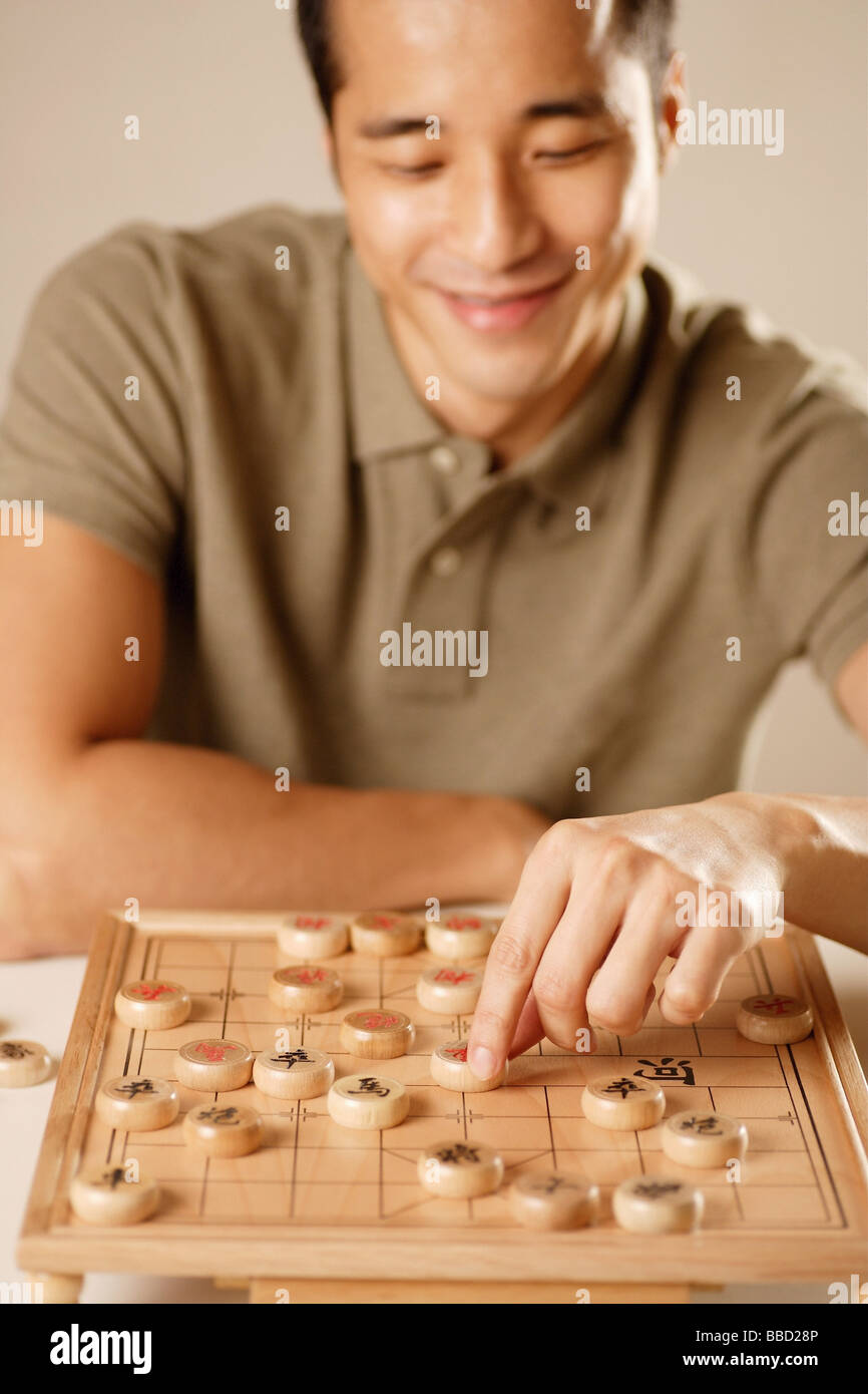Man playing Chinese chess Stock Photo - Alamy