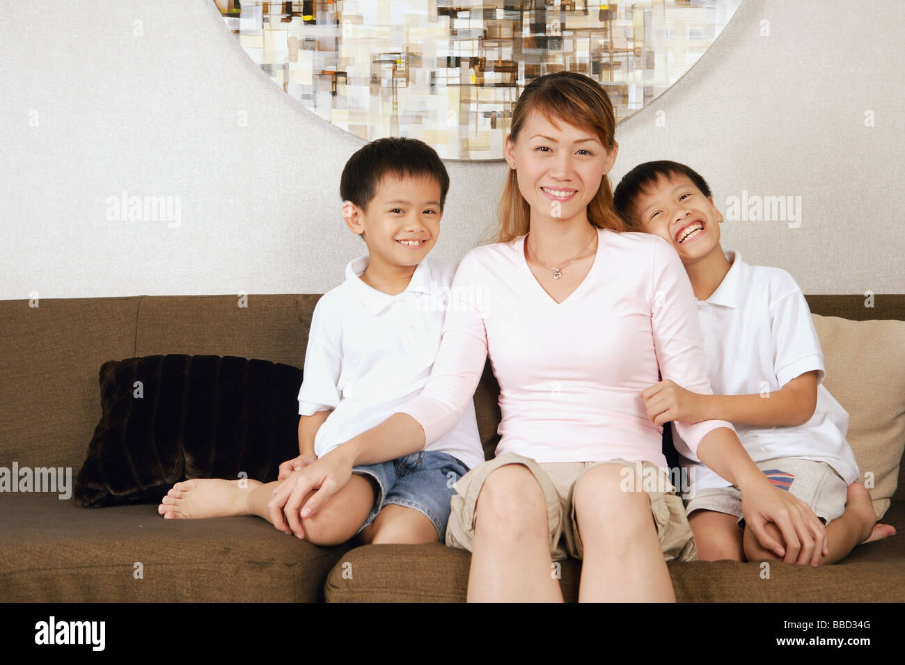 Mother with two children, portrait Stock Photo - Alamy