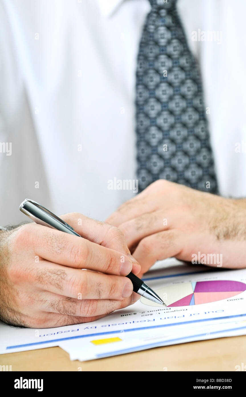 Reviewing charts hi-res stock photography and images - Alamy