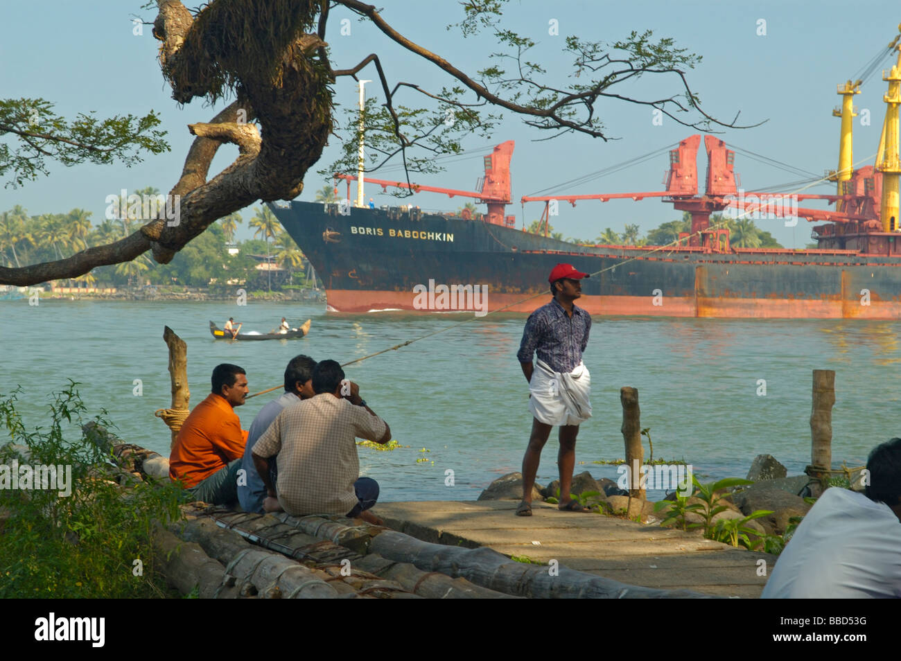India, Kerala, Fort Cochin (Cochi, Kochi). Local indian people relaxing ...