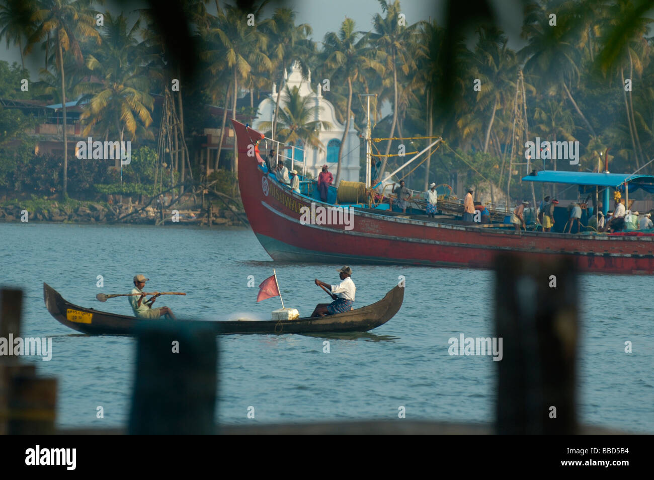 India, Kerala, Fort Cochin (Cochi, Kochi). Large and small boat with ...
