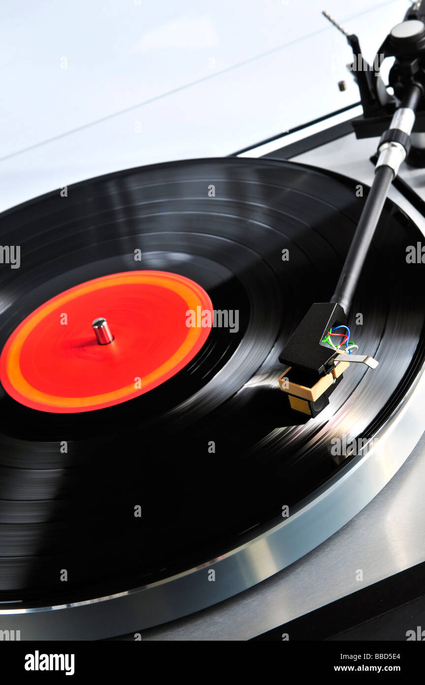 Vinyl record spinning on turntable close up Stock Photo - Alamy