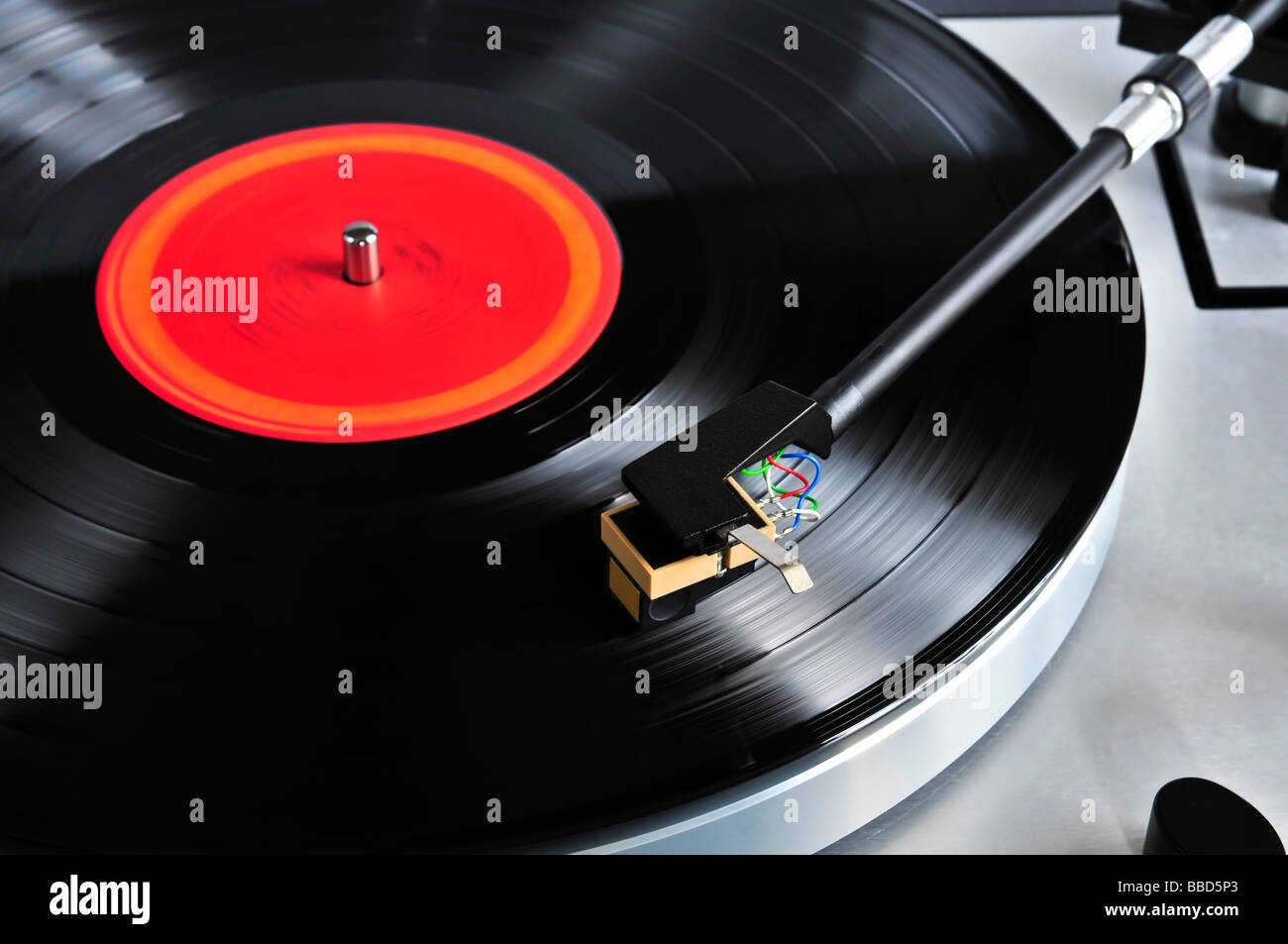Vinyl record spinning on turntable close up Stock Photo - Alamy