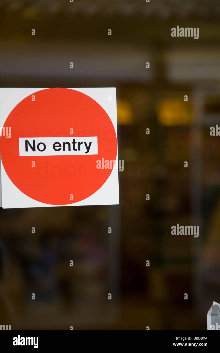 No entry sign on glass shop door Stock Photo - Alamy
