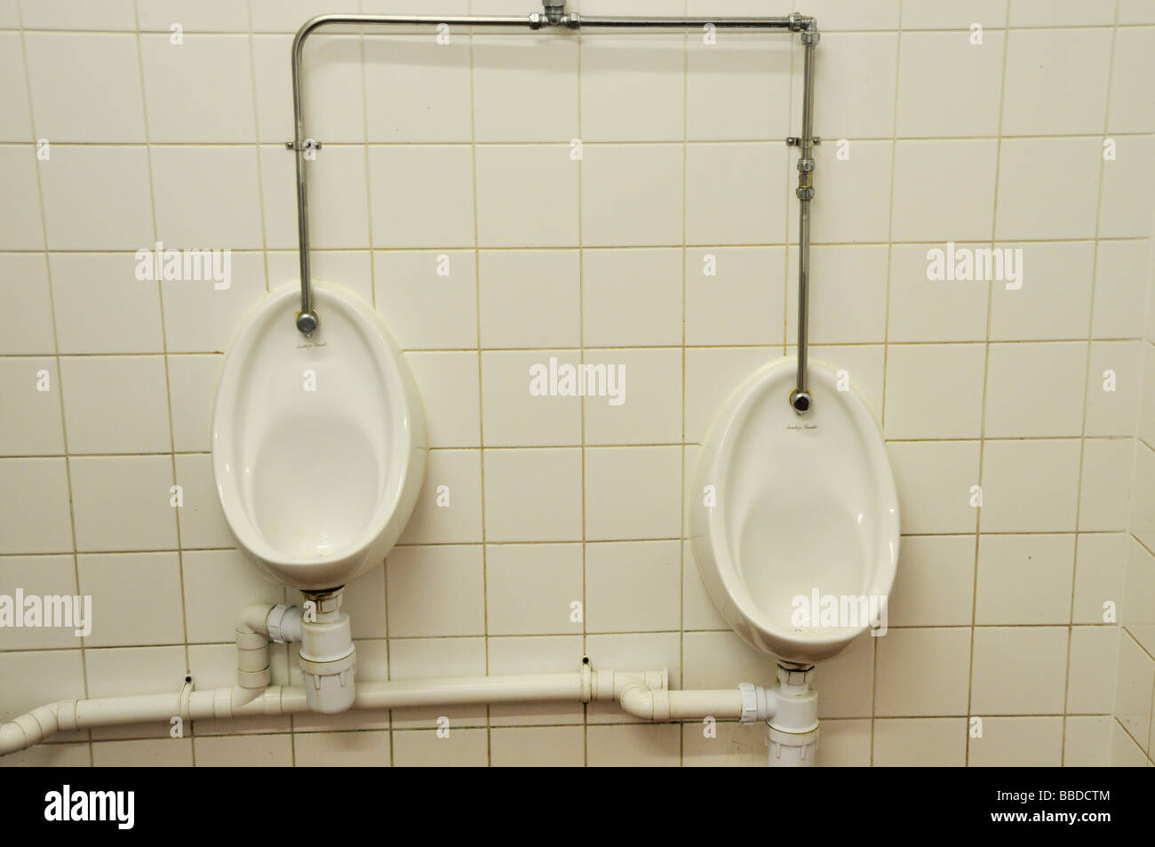 Public toilet urinals hi-res stock photography and images - Alamy