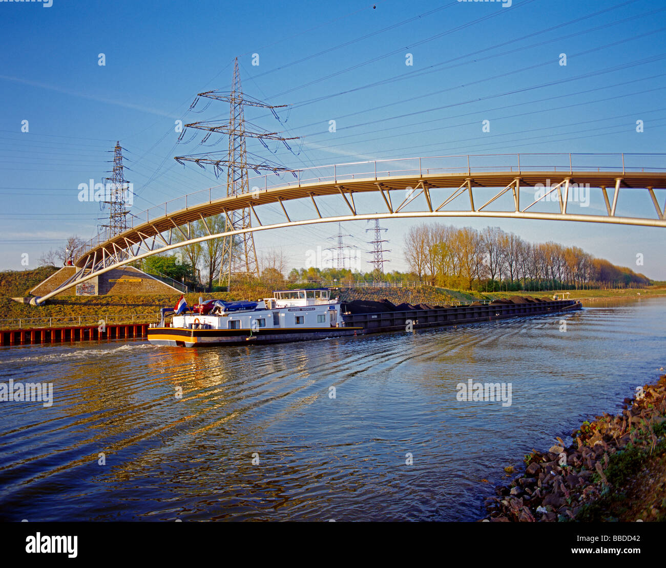 Barge under the pedestrian bridge over the Rhein Herne Canal ...
