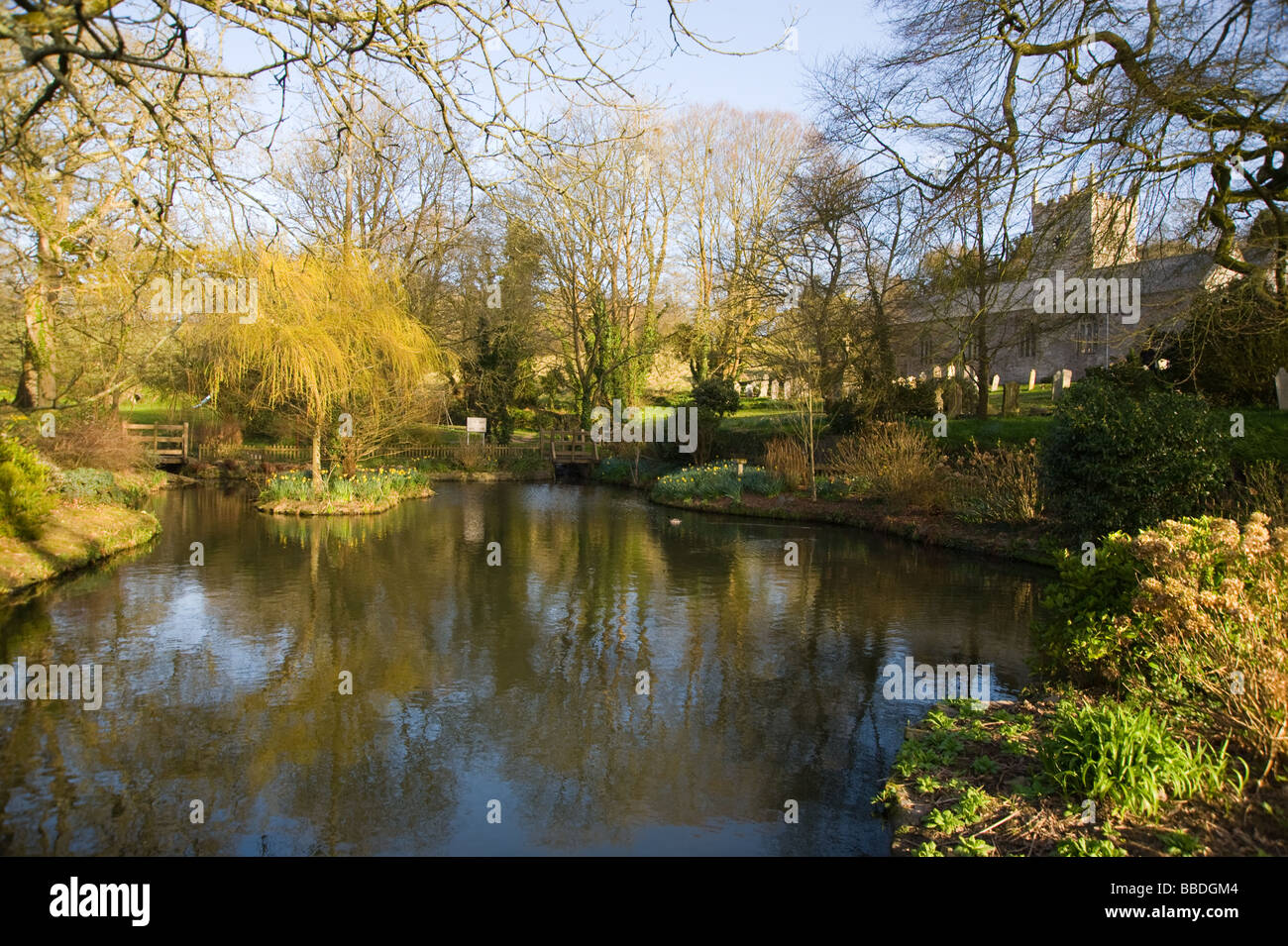 View of Veryan Church across the village pond Stock Photo - Alamy