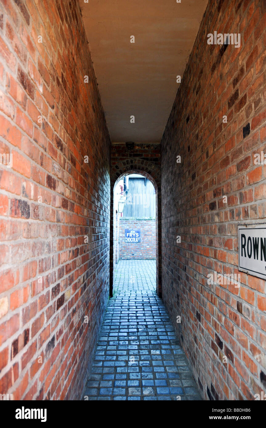 Passage way between buildings Stock Photo - Alamy