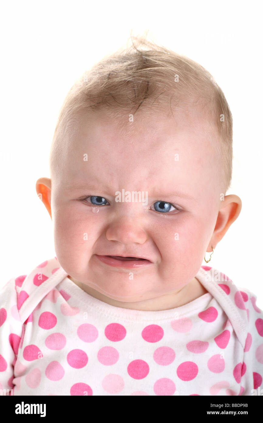 Poor baby girl crying isolated on white Stock Photo - Alamy