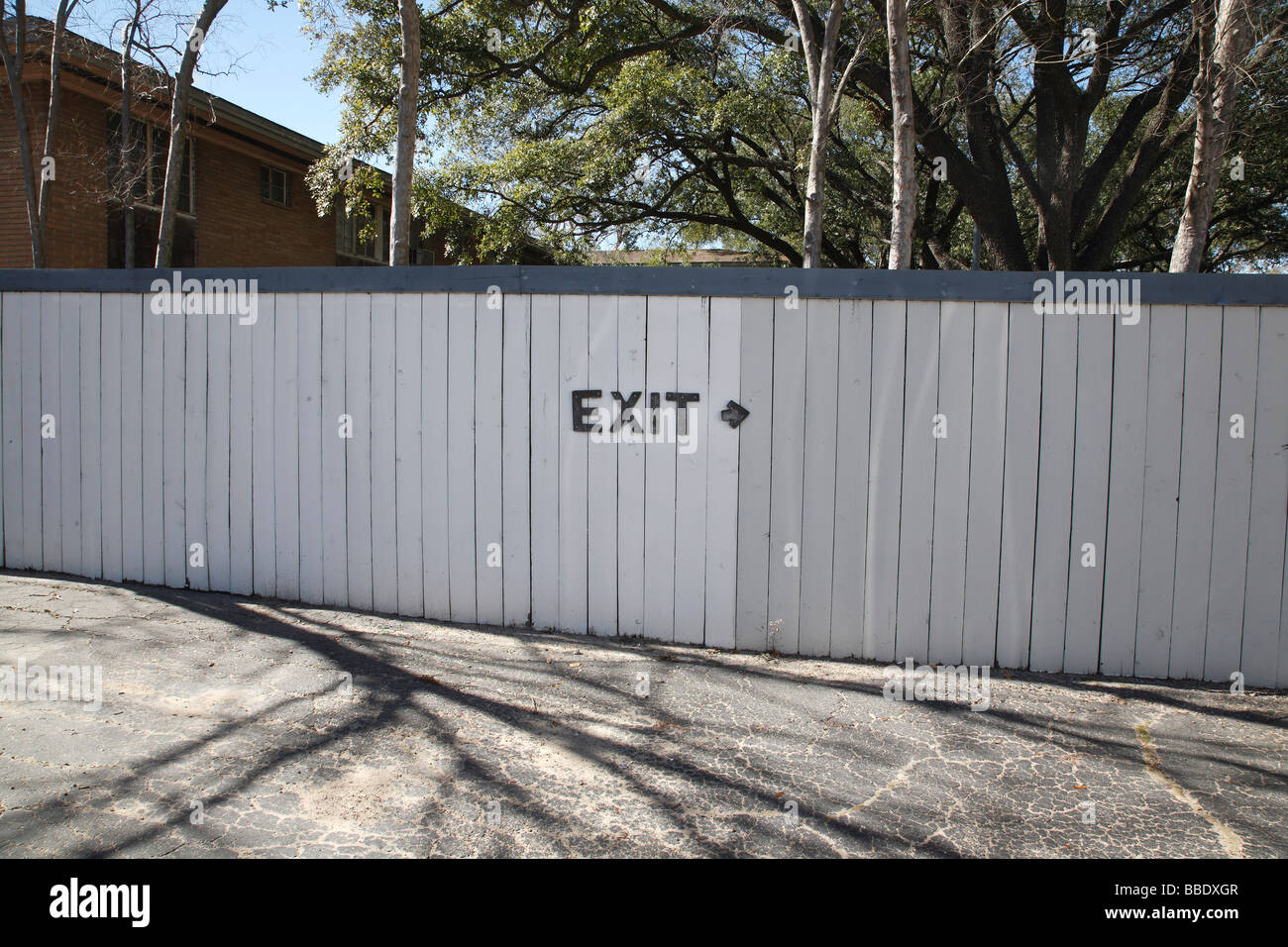 Exit Sign Painted on Fence Stock Photo - Alamy