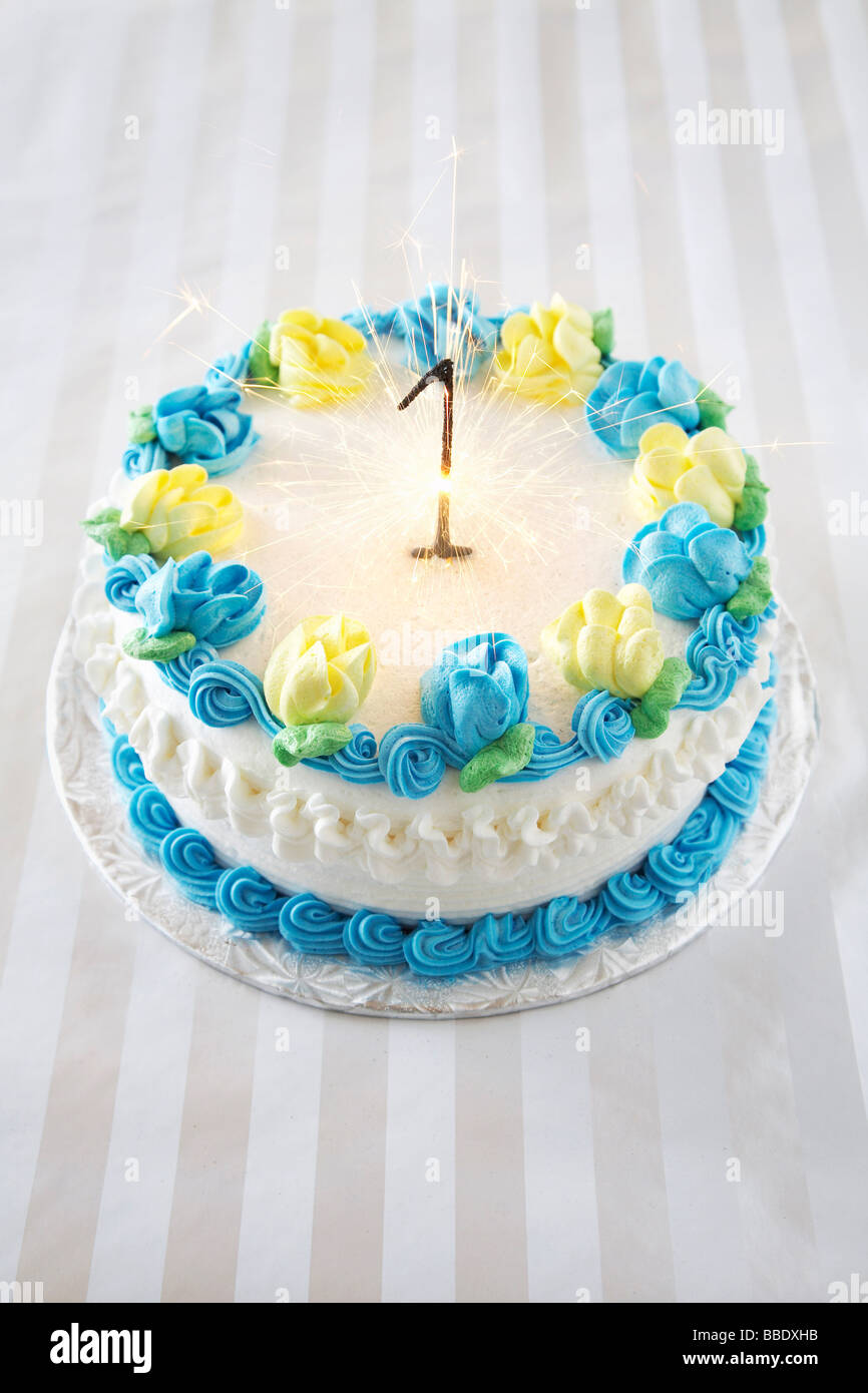 Close-up of Cake with Sparkler Stock Photo - Alamy