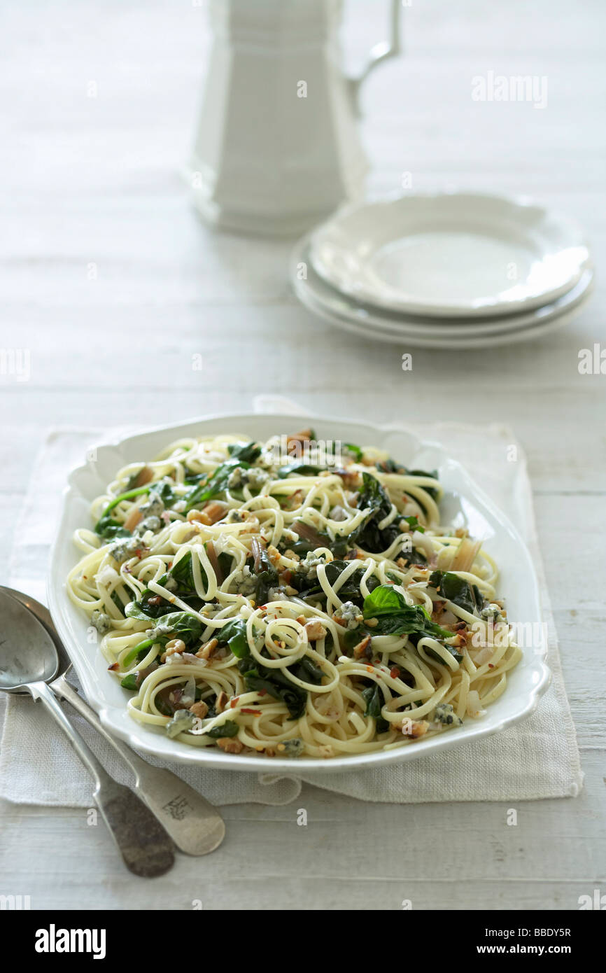 Spaghetti with Spinach, Walnuts and Blue Cheese Stock Photo - Alamy