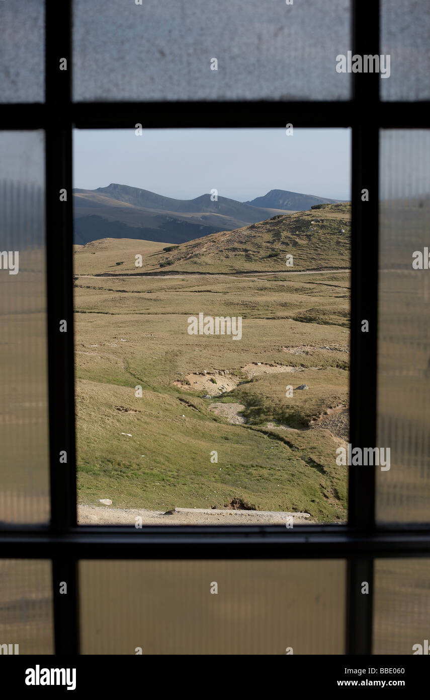 view of mountain through window Stock Photo - Alamy