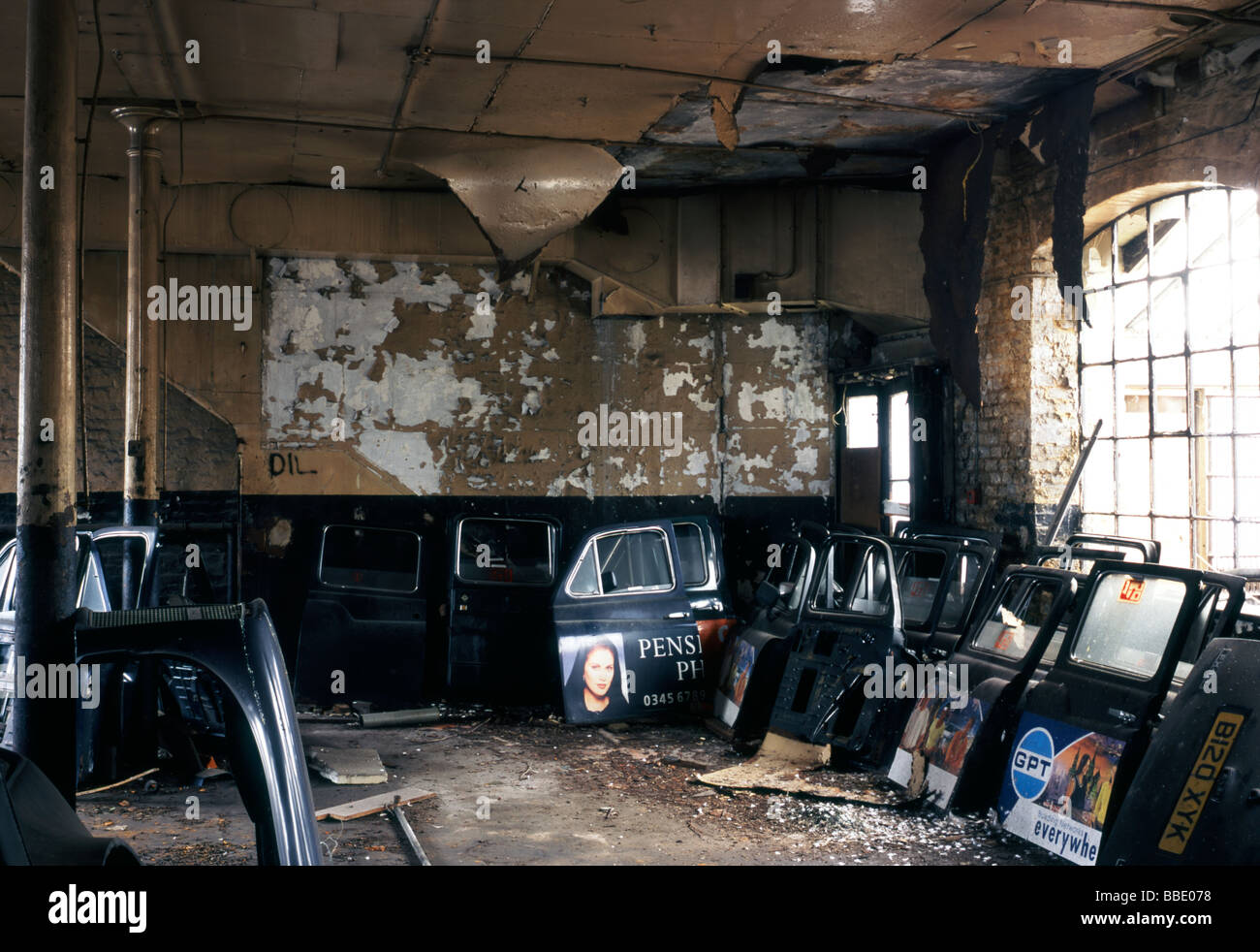 Derelict garage or workshop in Kings Cross London Stock Photo - Alamy
